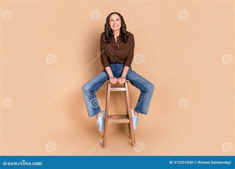 Full Size Photo Of Attractive Senior Woman Sit Chair Spread Legs