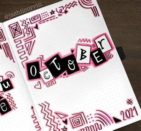 An Open Notebook With The Word October Spelled In Black And Pink