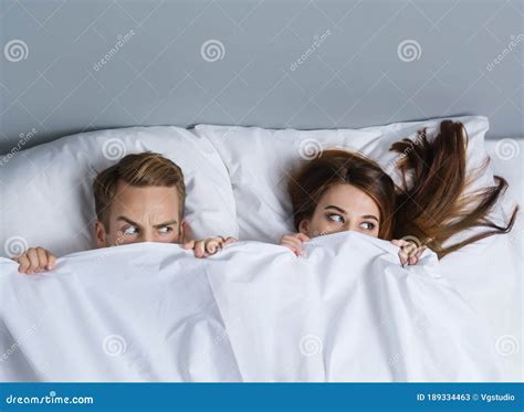 Playfull Couple Peeping From Bedsheet Stock Image Image Of Lovers Inlove 189334463