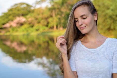 Premium Photo Close Up Of Beautiful Woman With Long Hair Thinking