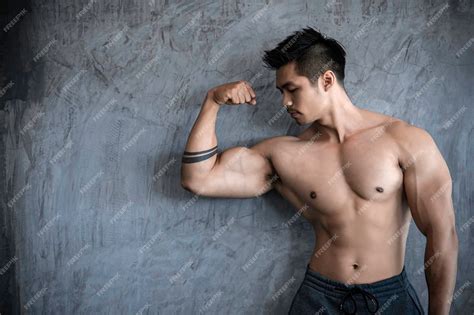 Premium Photo Portrait Of Asian Man Big Muscle At The Gymthailand Peopleworkout For Good