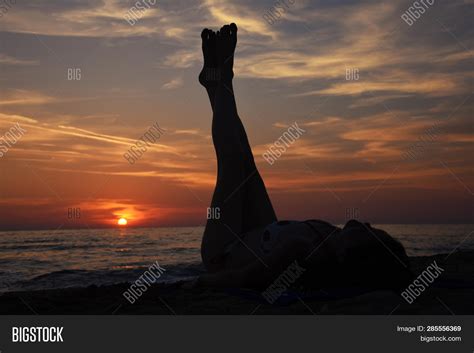 Woman Leg In Air Silhouette