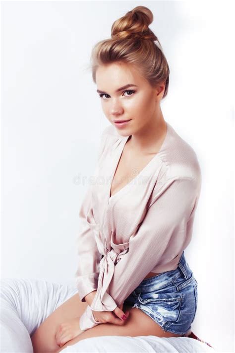 Young Pretty Blond Woman Laying In Bed Isolated On White Background Lifestyle People Concept
