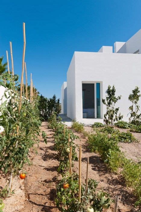 Summer House In Santorini By Kapsimalis Architects Is Comprised Of Cubistic White Volumes