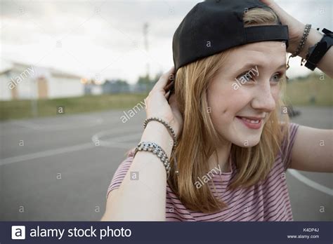 Backwards Cap On Smiling Girl Hi Res Stock Photography And Images Alamy