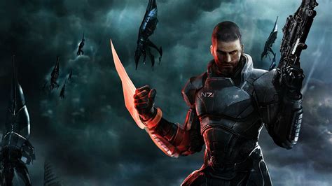 Man Holding Rifle And Red Claw Hd Wallpaper Mass Effect Video Games Commander Shepard