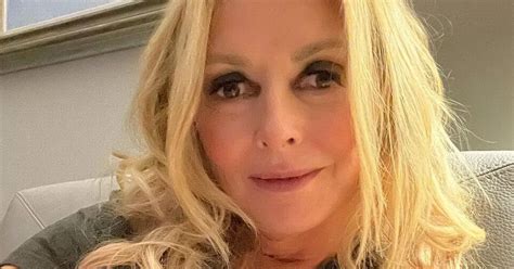 Carol Vorderman Showcases Killer Curves In Tight T Shirt As She Awaits New Arrival Daily Star