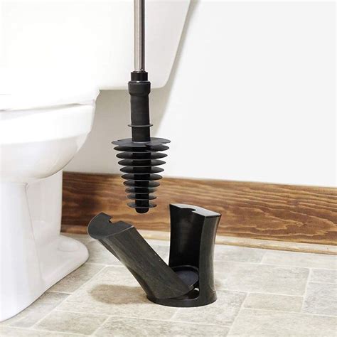 A 2 In 1 Toilet Plunger And Squeegee Thatll Flush Out Clogs In One Swift Movement And Clean