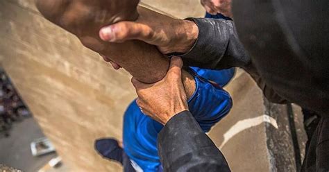 Twisted Isis Executioner Dangles Gay Man By His Ankles Before Dropping Him 100ft To Crowd Below