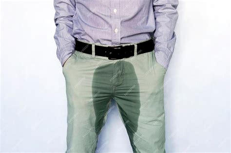 Premium Photo Problems With The Bladder The Concept Of Mens Health Young Man In Light