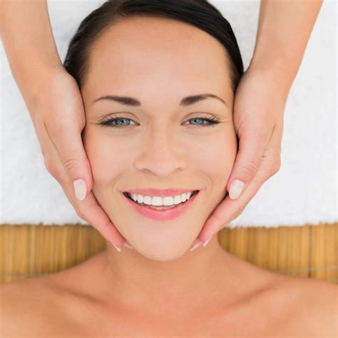 Premium Photo Peaceful Brunette Enjoying A Facial Massage
