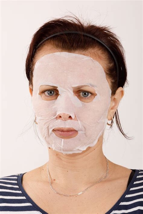 Housewife Woman With A Sheet Mask On Her Face Stock Image Image Of Adult Face 101003783