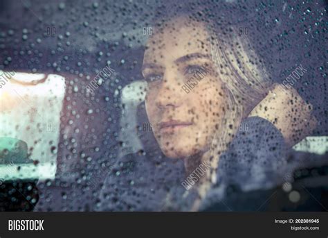 Sad Woman Looking Out Window