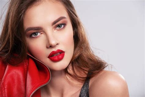 Portrait Of Beautiful Young Woman With Bright Makeup Beautiful Brunette With Bright Red