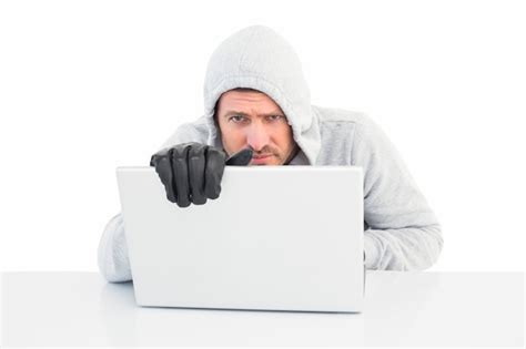 Premium Photo Hacker Using Laptop To Steal Identity