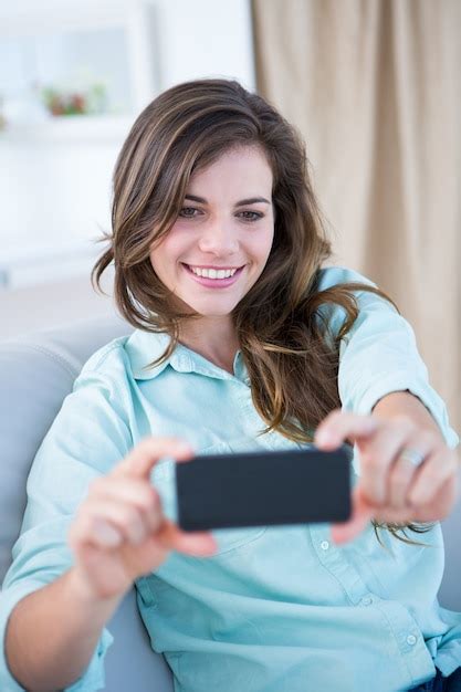 Premium Photo Beautiful Brunette Taking Selfie